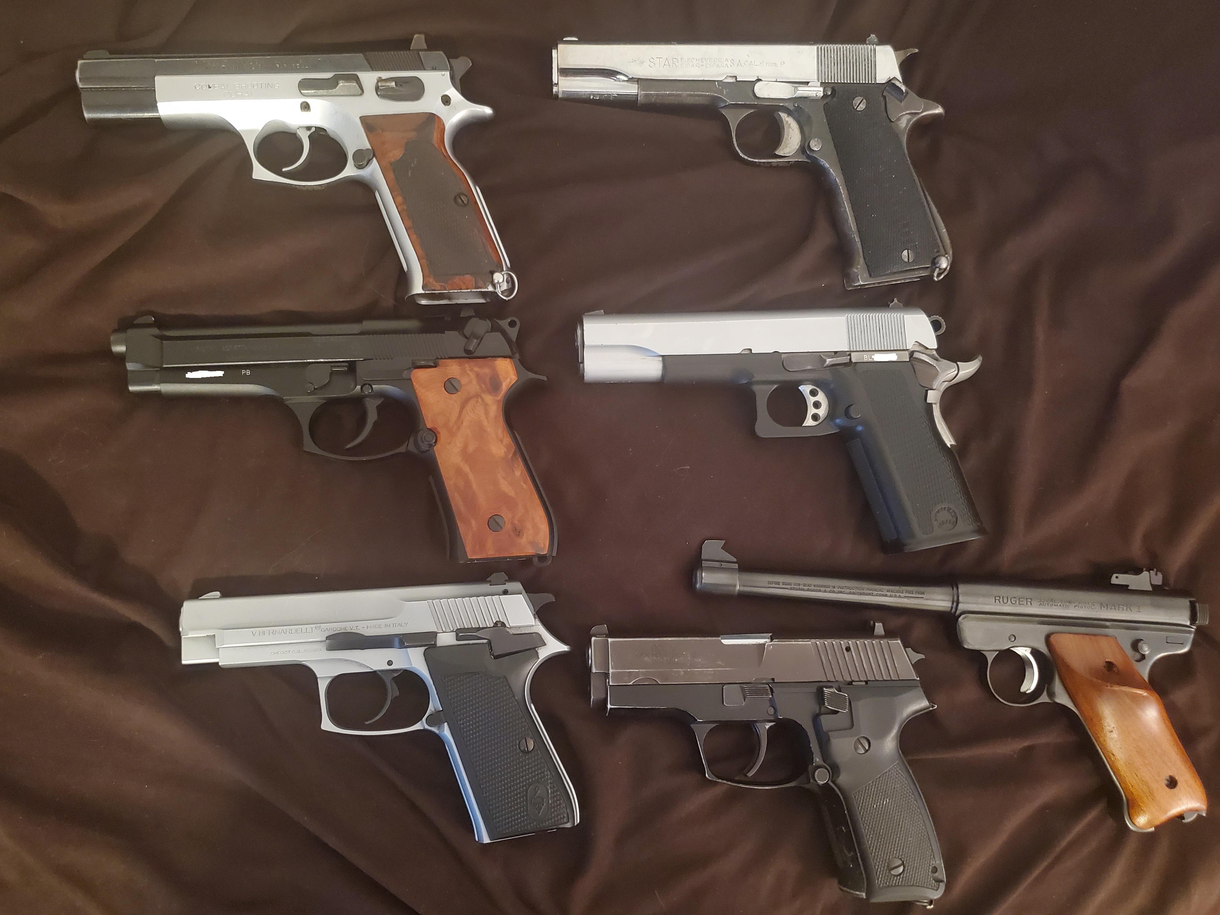 Handgun Family Photo | Scrolller
