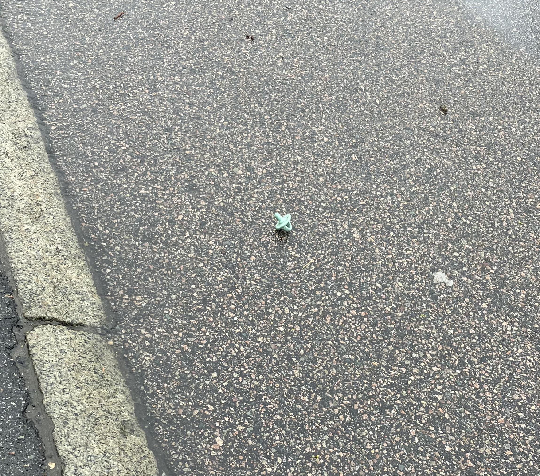 Pacifier On The Street Scrolller
