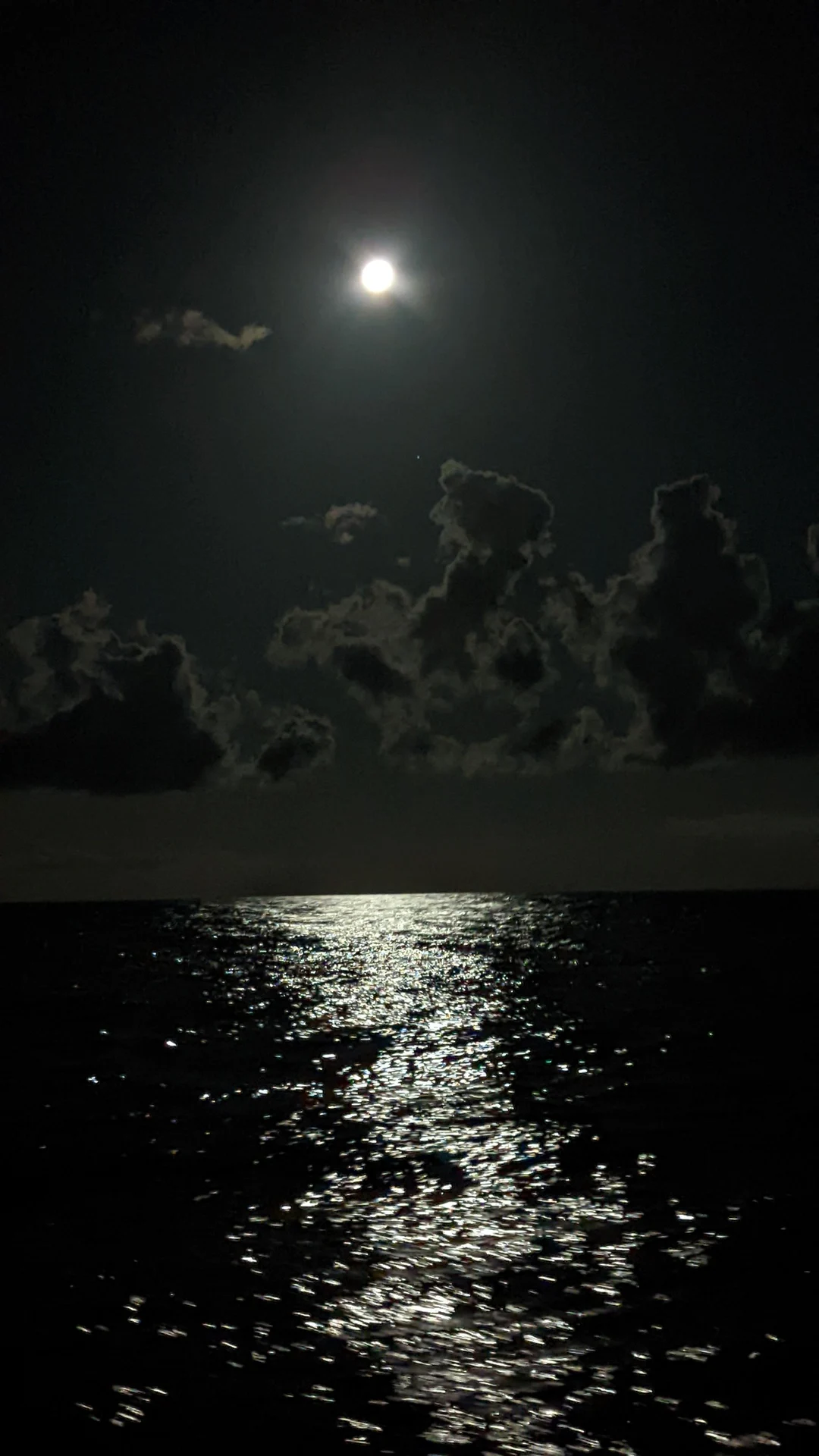 The moon from the cockpit at 3am, 100 miles out to sea | Scrolller