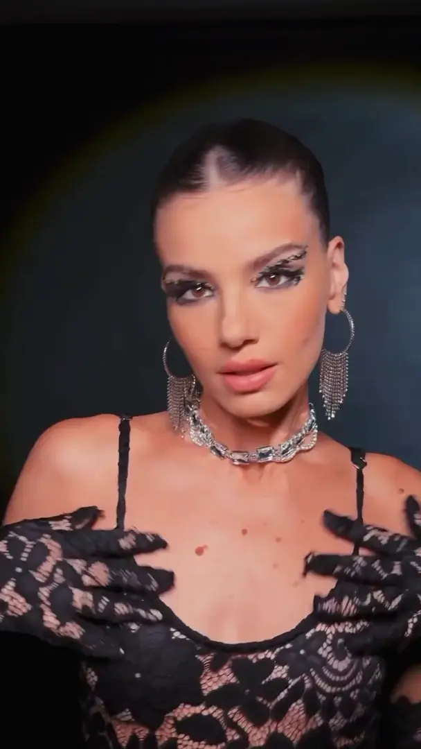 Camila Queiroz • Brazilian actress and model in black lace see-thru bodysuit | Scrolller