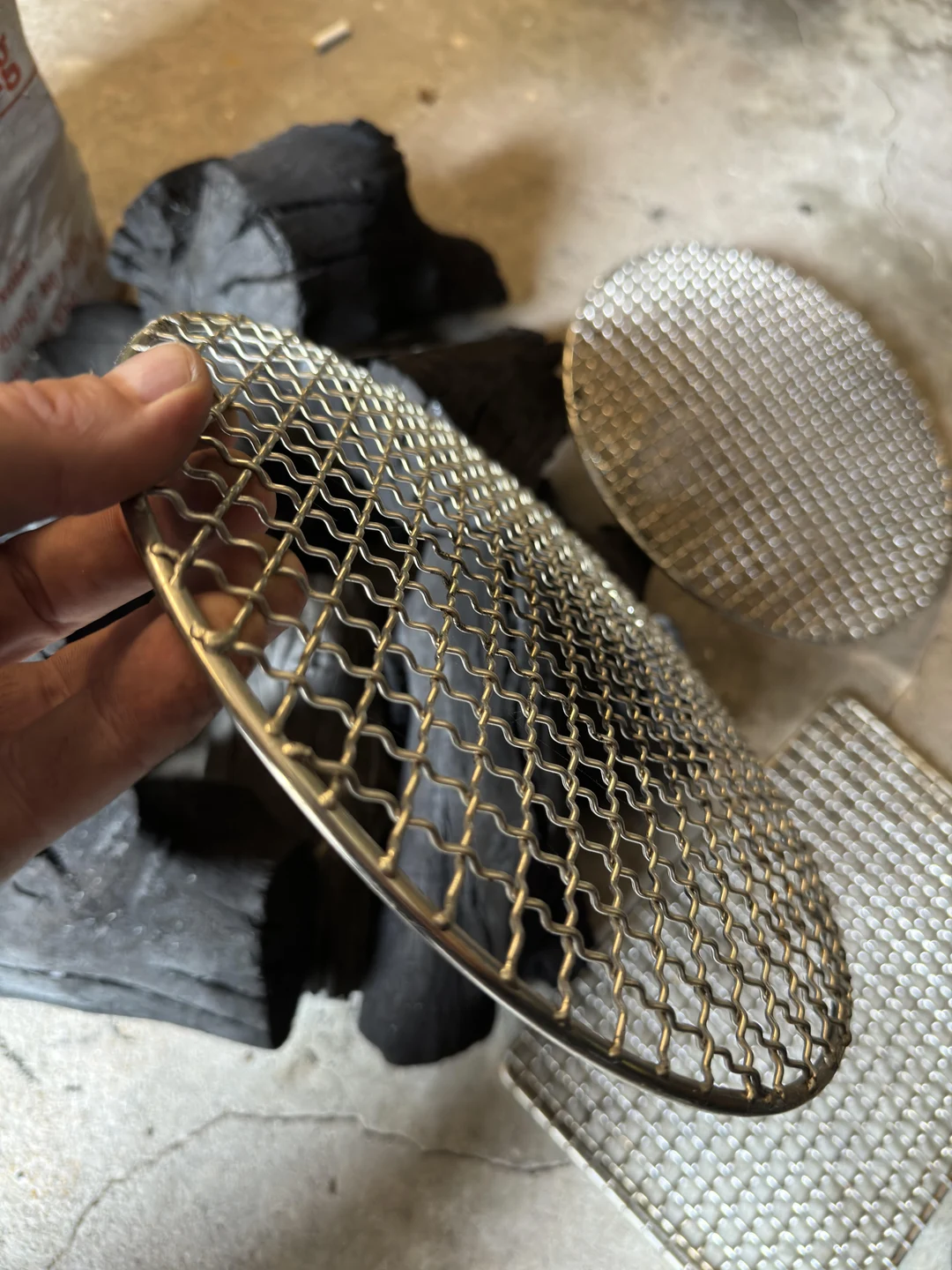 Japanese Shichirn grate. Every intersecting wire is welded . | Scrolller