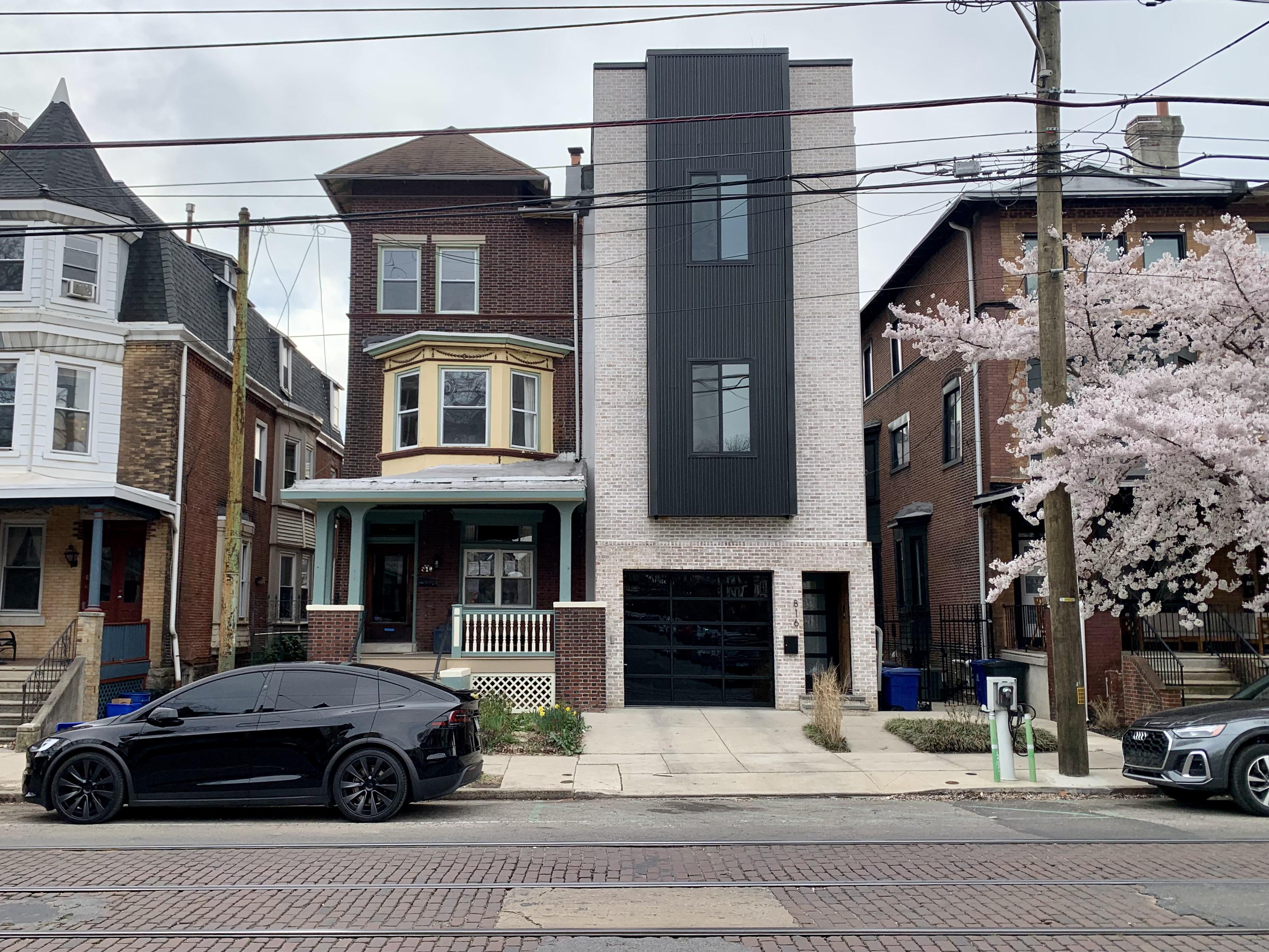 Old and new twin houses. | Scrolller