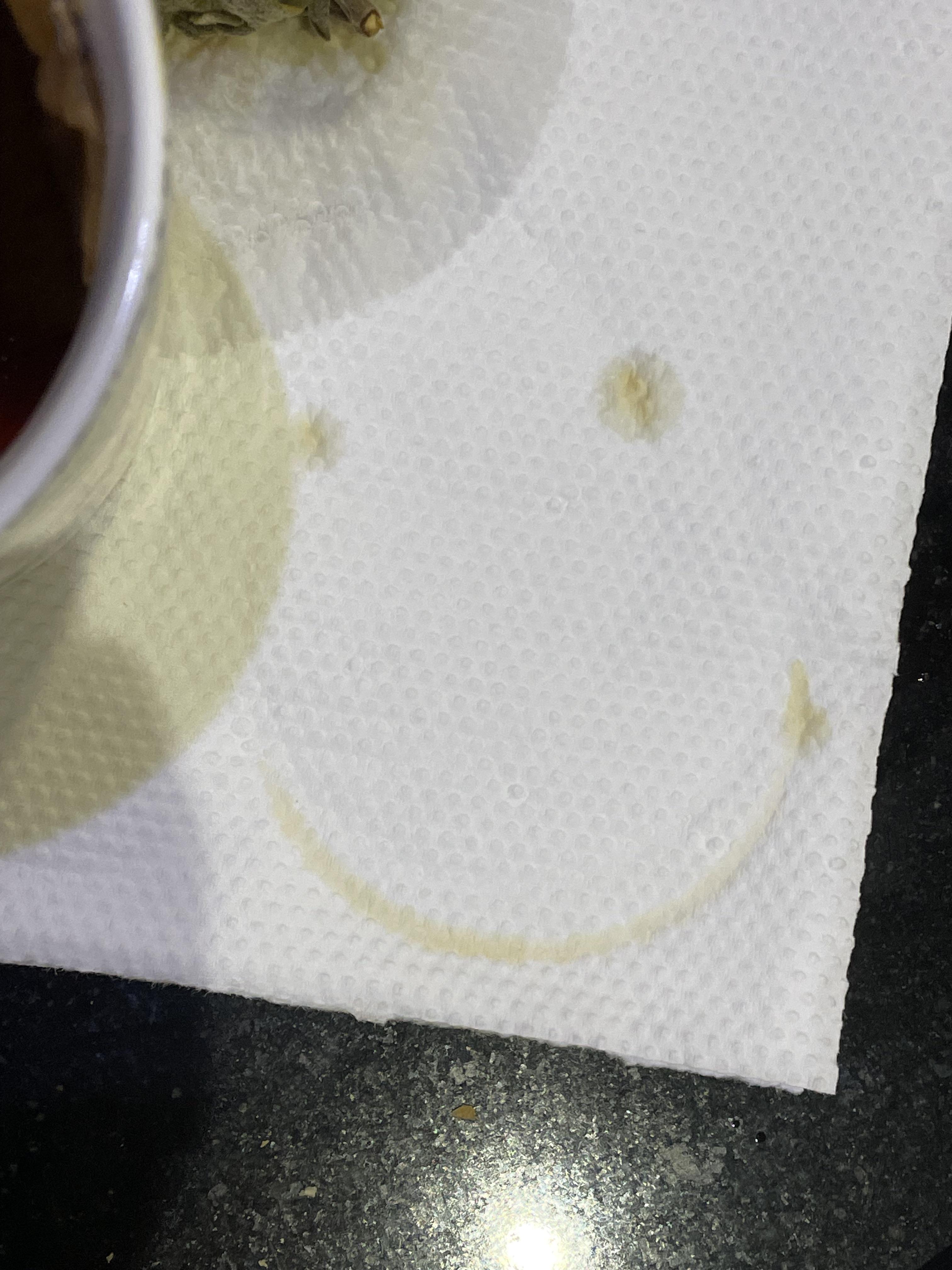 A stain under my tea mug made a smiley face. | Scrolller