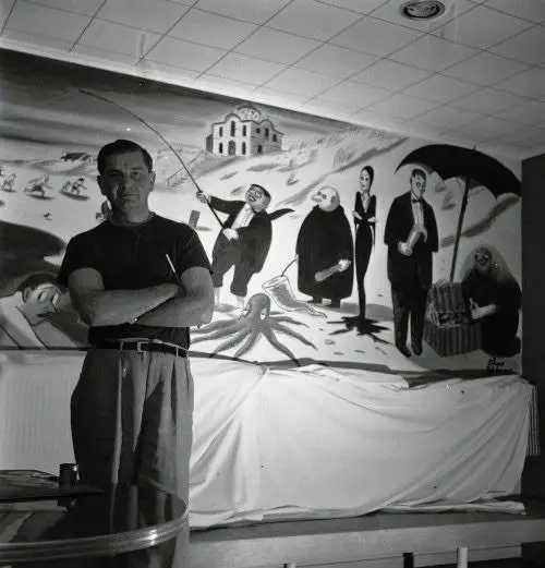 Charles Addams posing for a 1952 issue of Look Magazine. | Scrolller