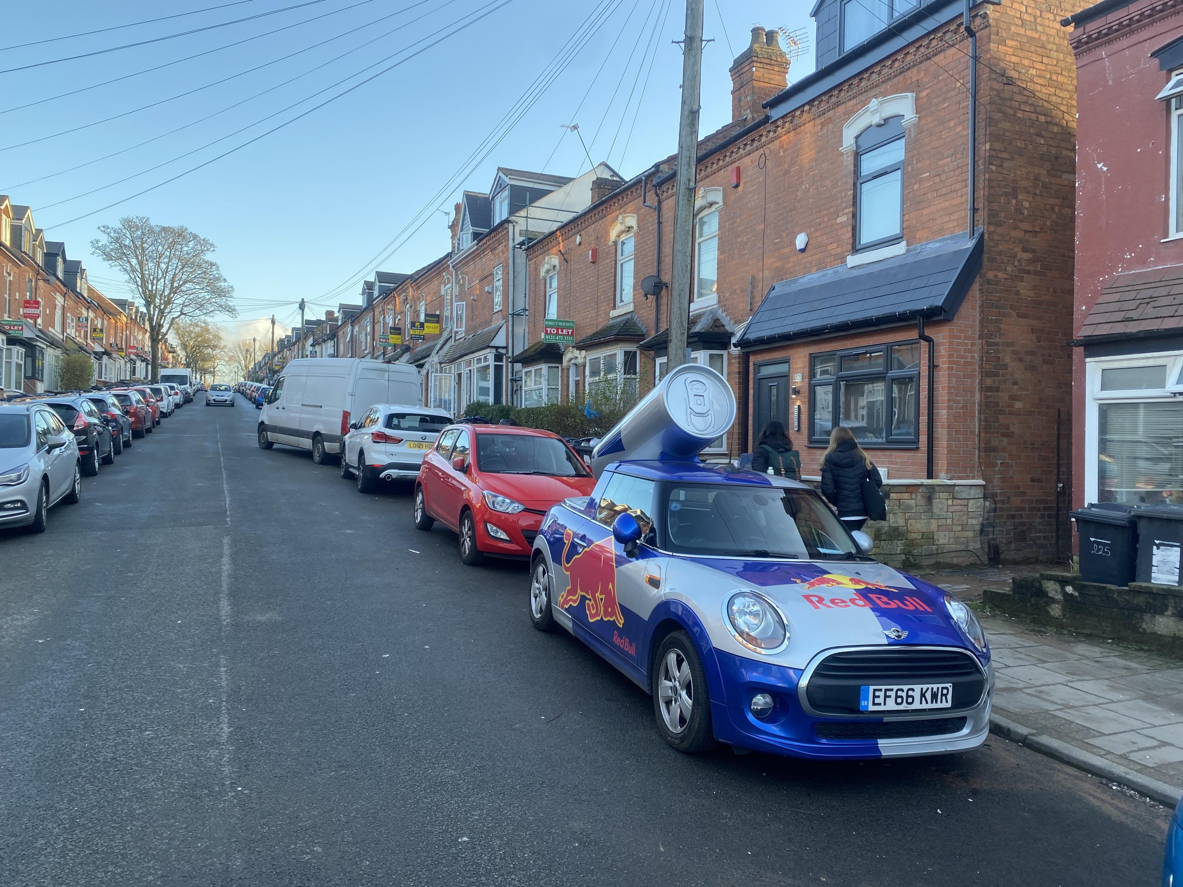 [ Mini Cooper Red bull edition] has an not insured notice on the front window | Scrolller