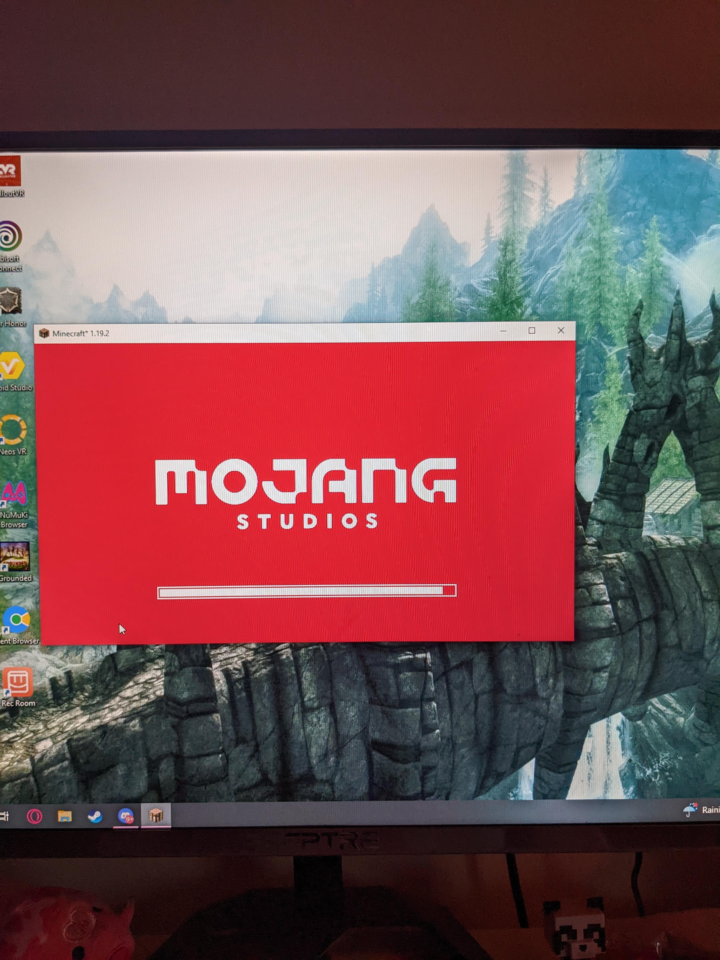 Minecraft is stuck on the red Mojang screen and wont get past this, music is playing though ...