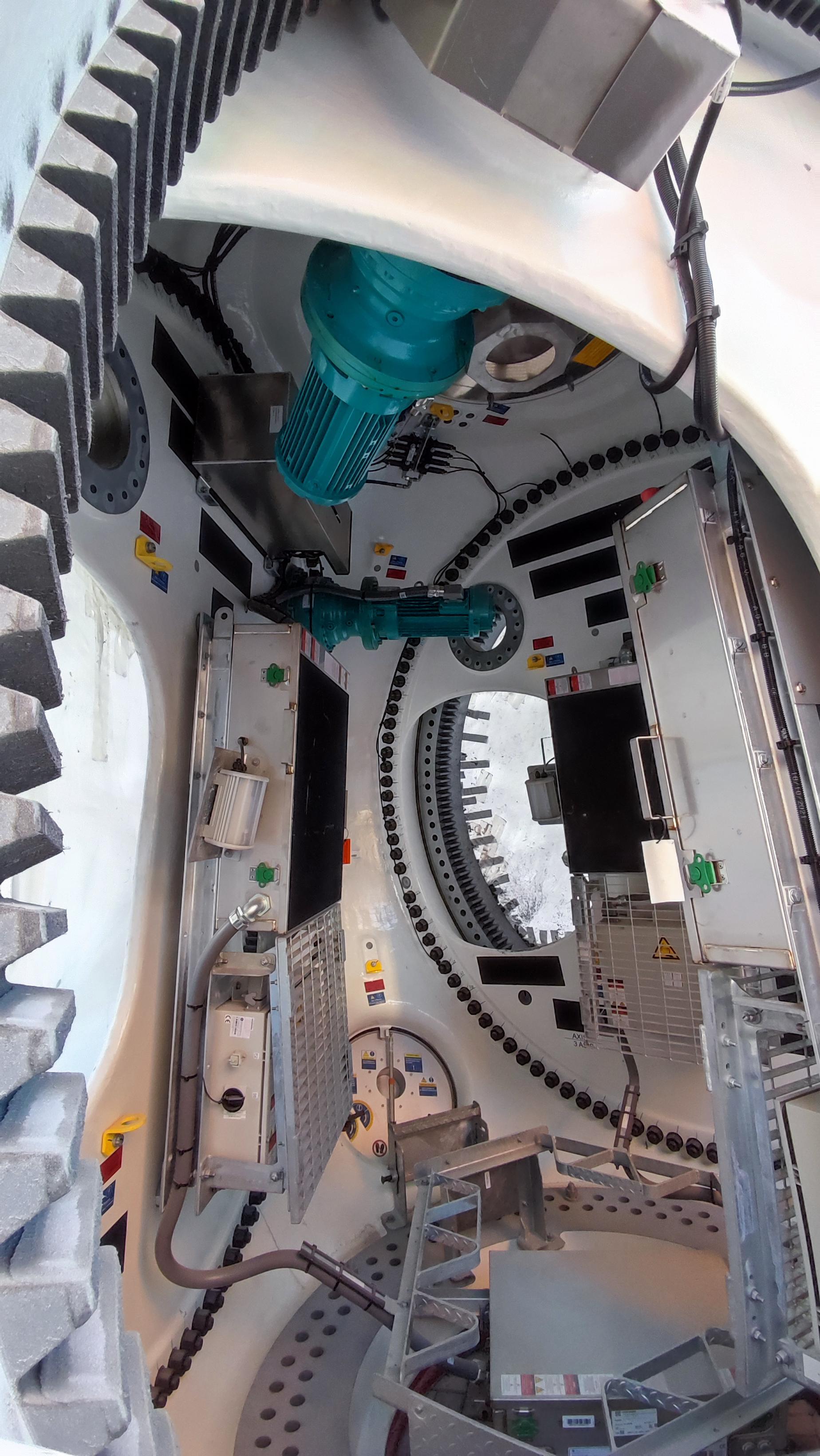 The inside of a wind turbine hub | Scrolller