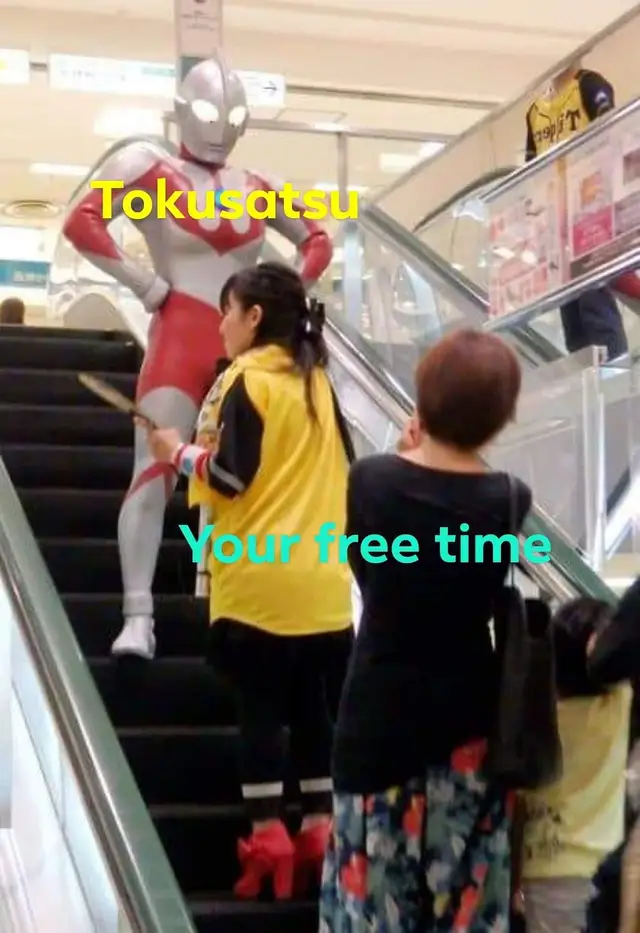 Ultraman on escalator | Scrolller