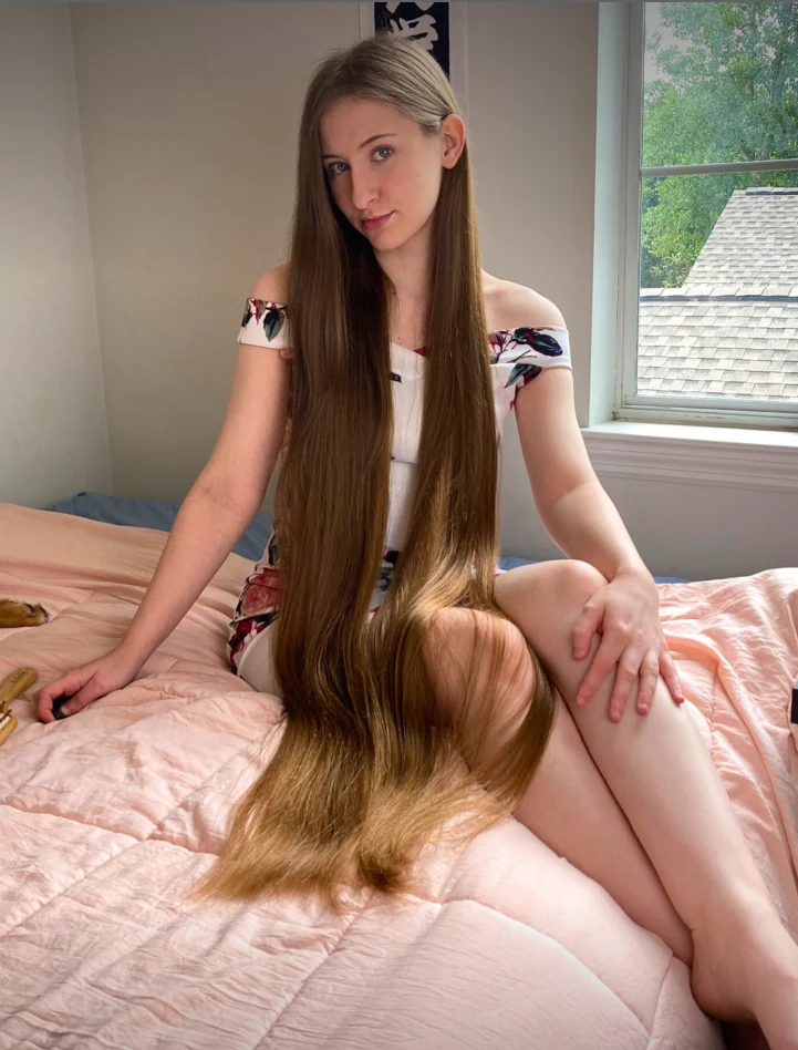 My favorite part about having long hair is being able to drape it across my lap (: | Scrolller