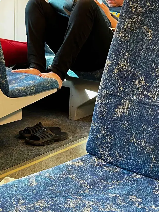 Bare feet on transit seats | Scrolller
