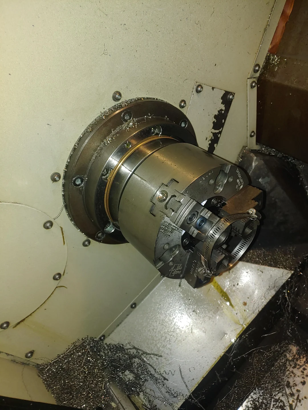 got fed up fighting a 3 jaw chuck to install it so i locked the jaws so it will thread into the ...