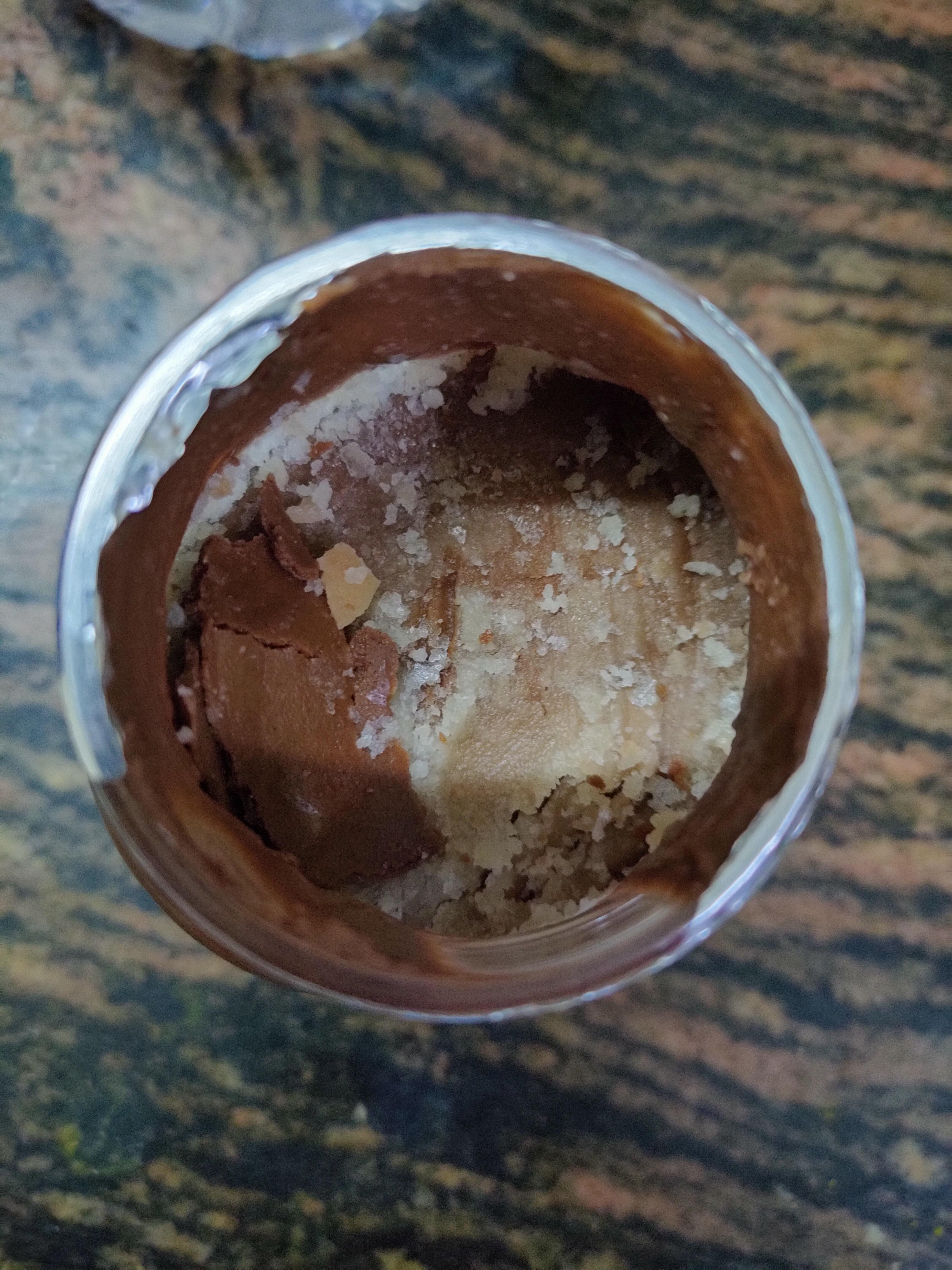 Some white stuff has appeared in hershey's spread.Is it some sort of oil?And is it safe to ...