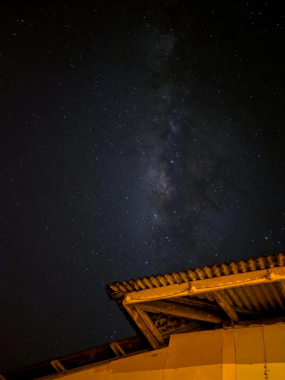 Milky way above small hut | Scrolller