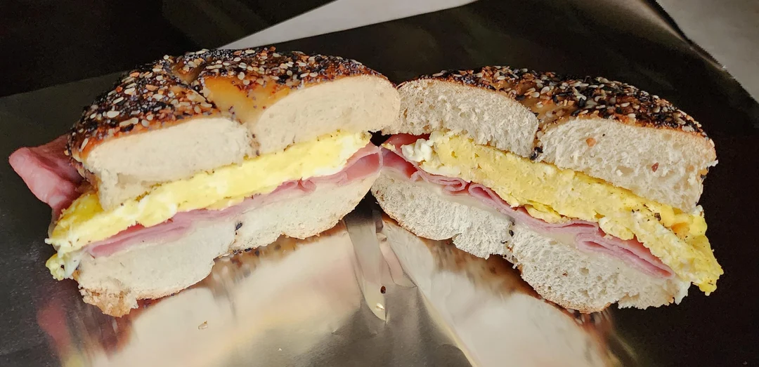 Made my own breakfast sandwich with a bagel from my local NY pizza place this morning. Ham, eggs ...