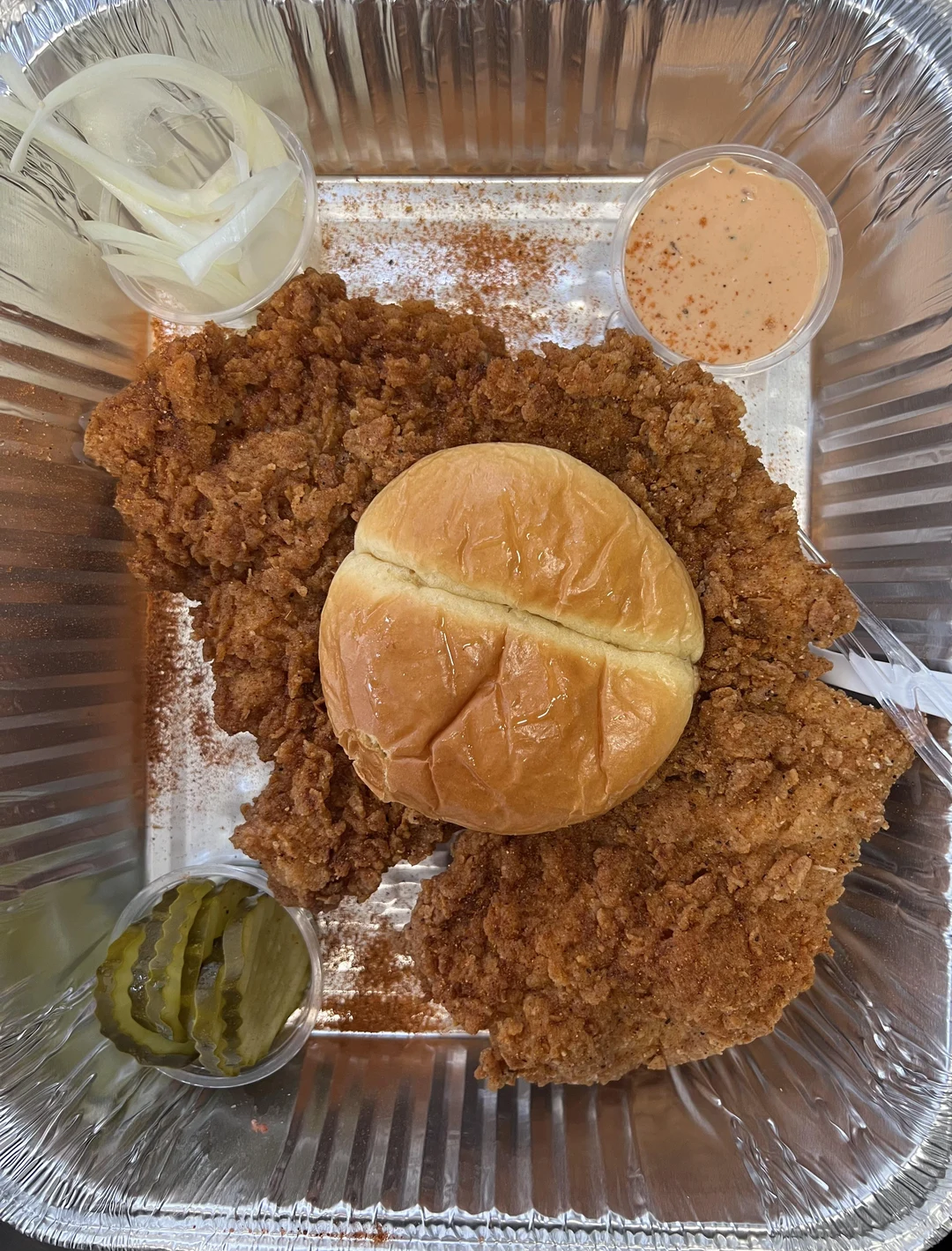 Giant breaded pork tenderloin final product | Scrolller