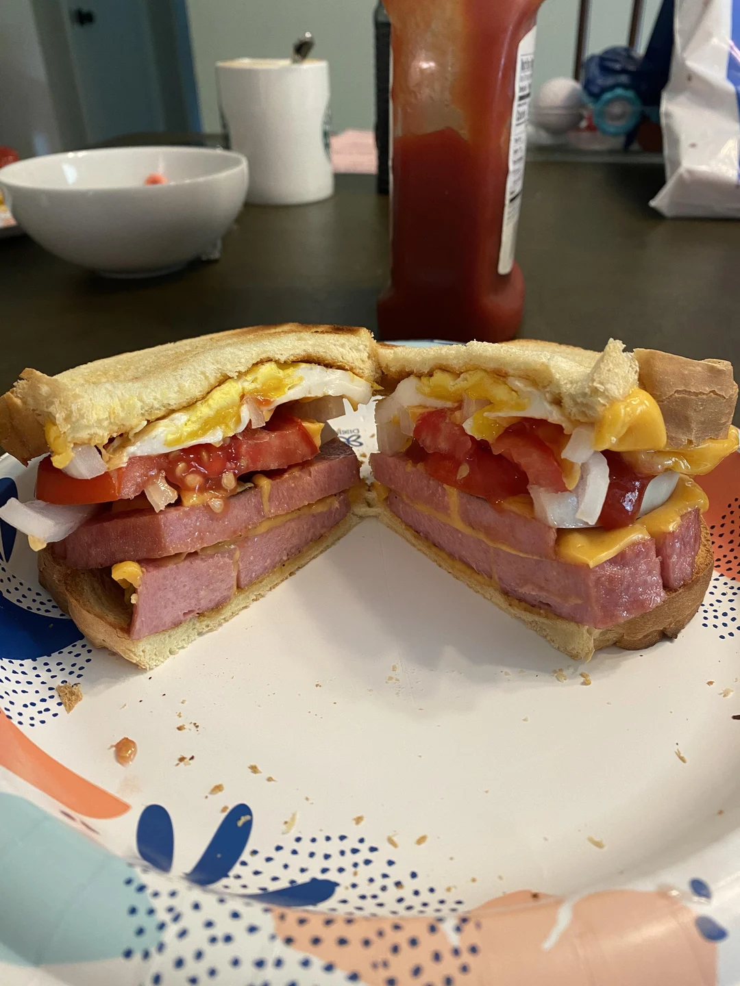 Trenton porkroll, egg and cheese with raw tomato, onion and ketchup. | Scrolller