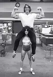 Arnold Schwarzenegger sits on the shoulders of bodybuilder and future star of Playboy magazine ...
