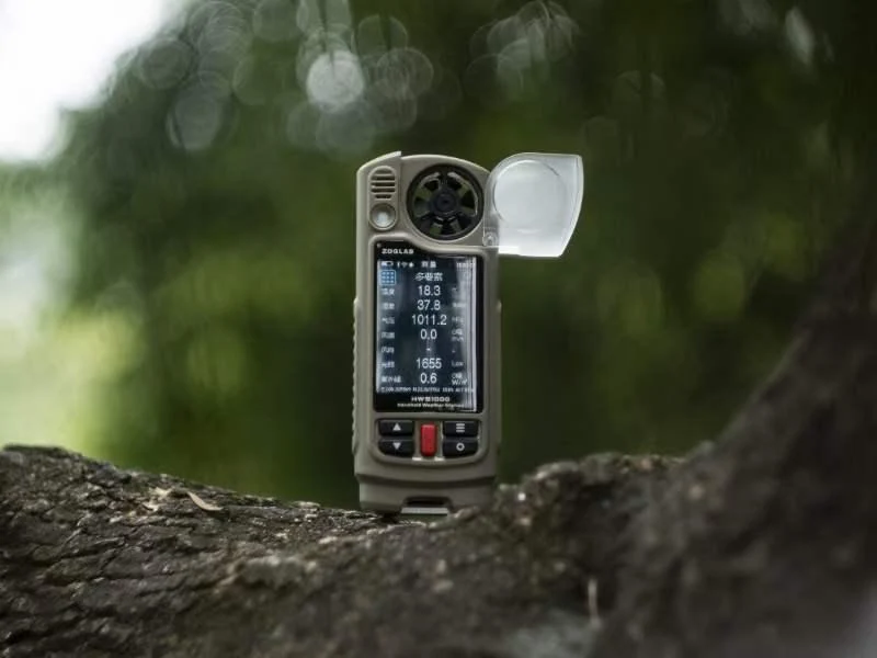 Handheld weather station to measure the temperature, humidity, pressure, wind speed, wind ...