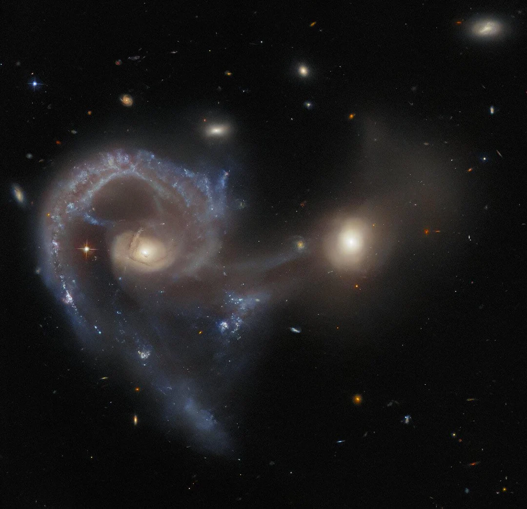 New Hubble image reveals intergalactic bridge between two merging Galaxies | Scrolller
