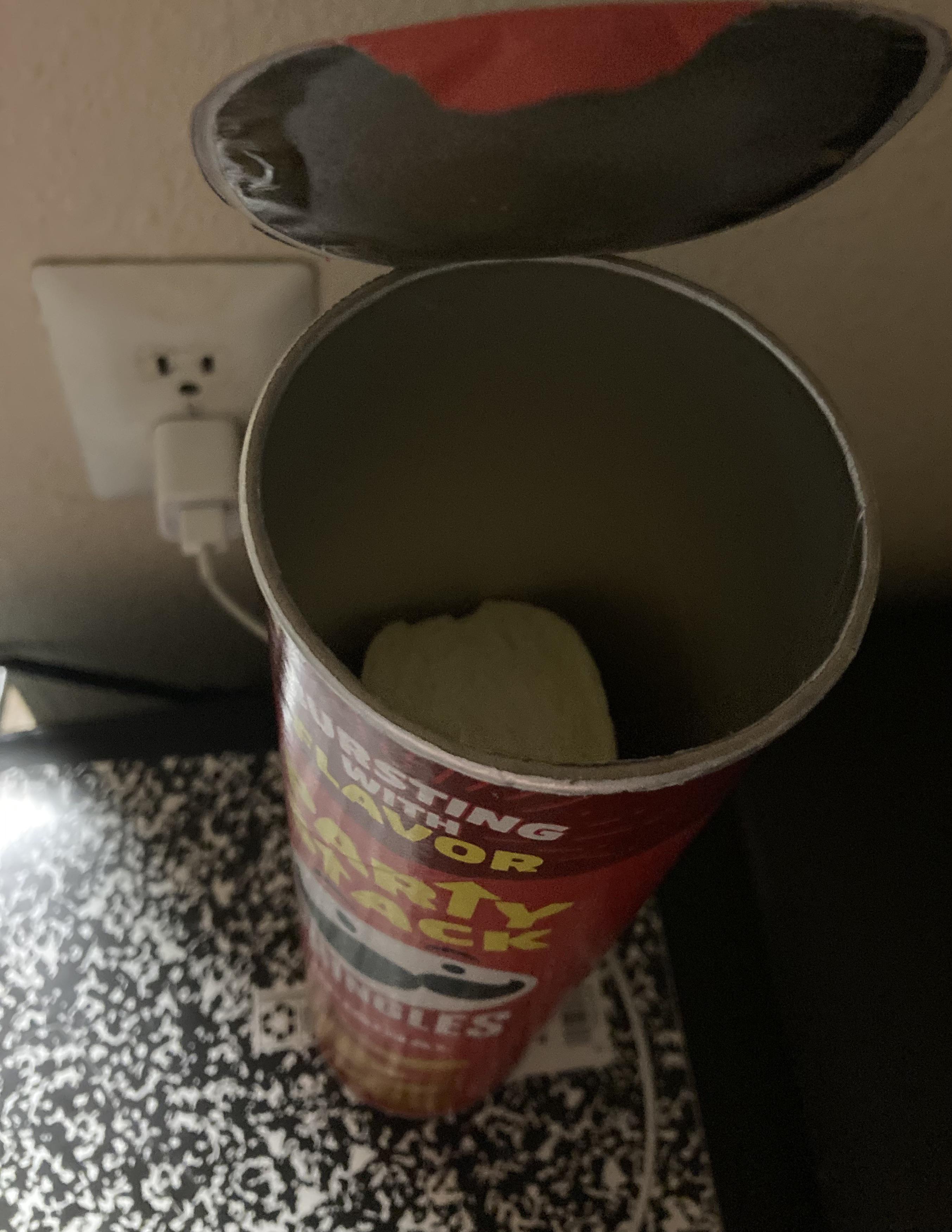 Definitely didn't eat half a tube of pringles before taking the photo | Scrolller