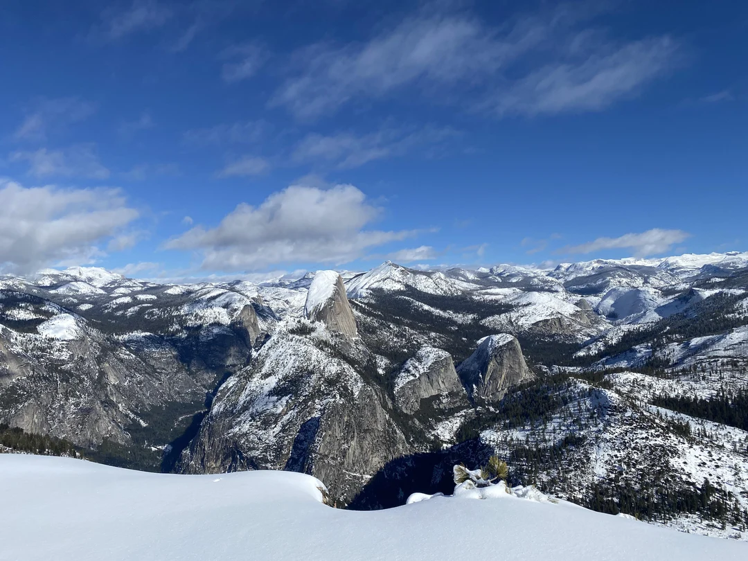 Yosemite with a snow covered Half Dome | Scrolller