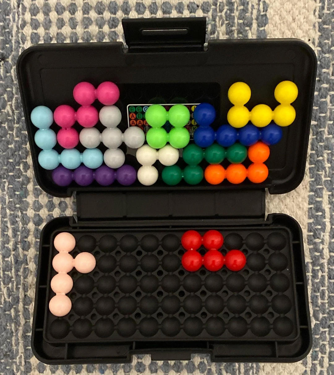 Need help with this Kanoodle puzzle! I've tried this for about an hour and a half and still can ...