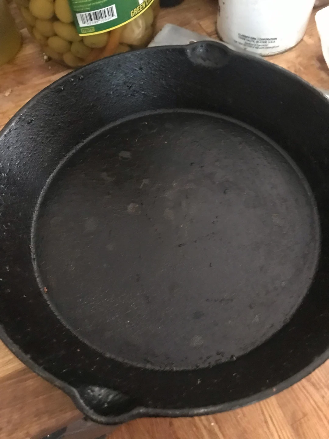 does anyone know how to clean all the rust off a cast iron pan? it became rusty because my mom ...