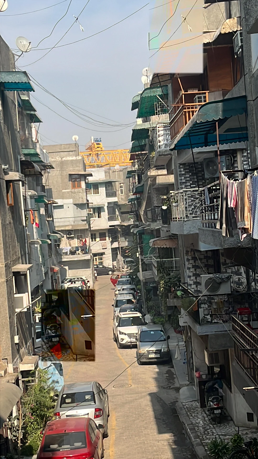 What is that rectangle and artifacts in the sky on the right? Took a zoomed pic through whatsapp ...