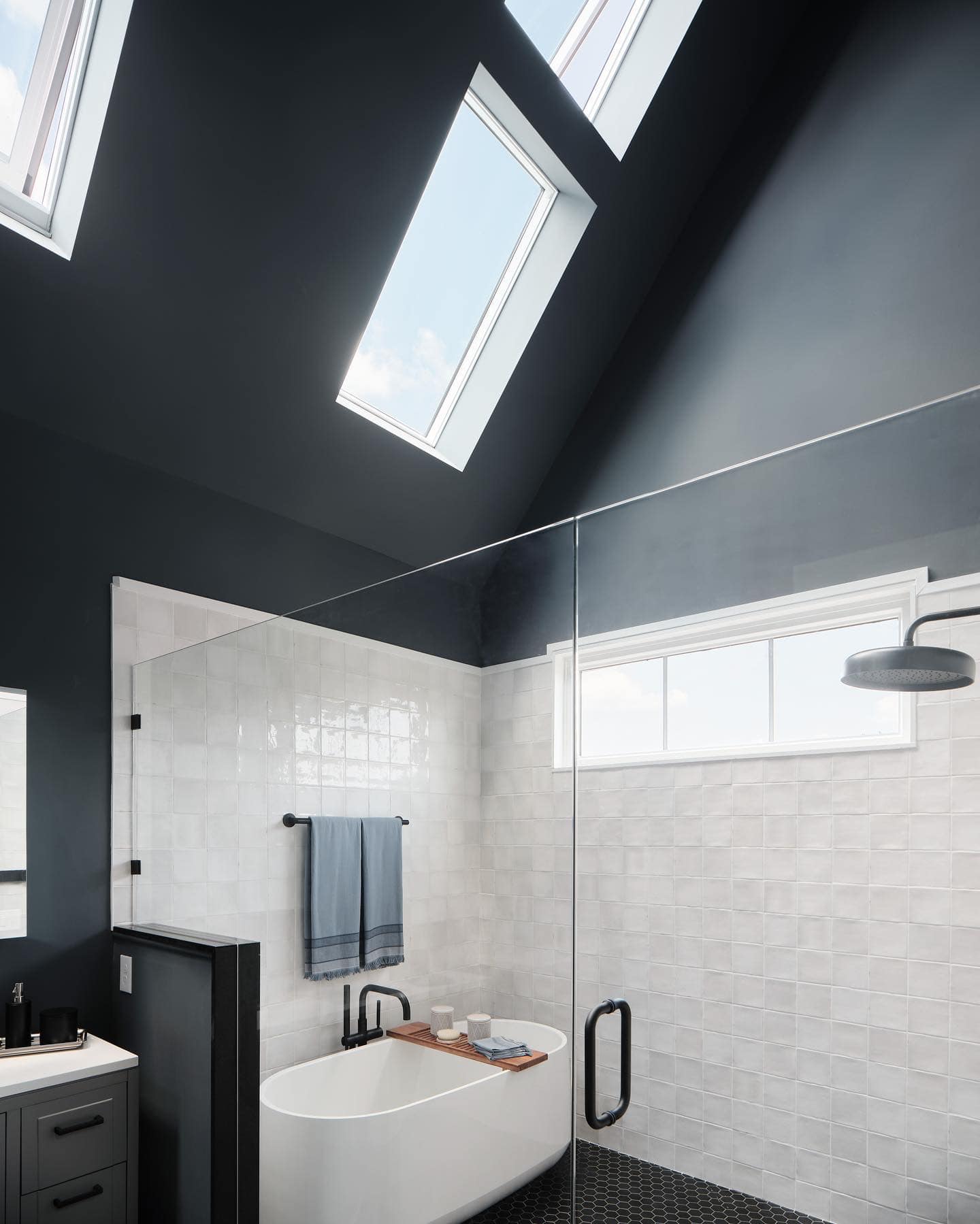 Bathtub under the skylight. | Scrolller