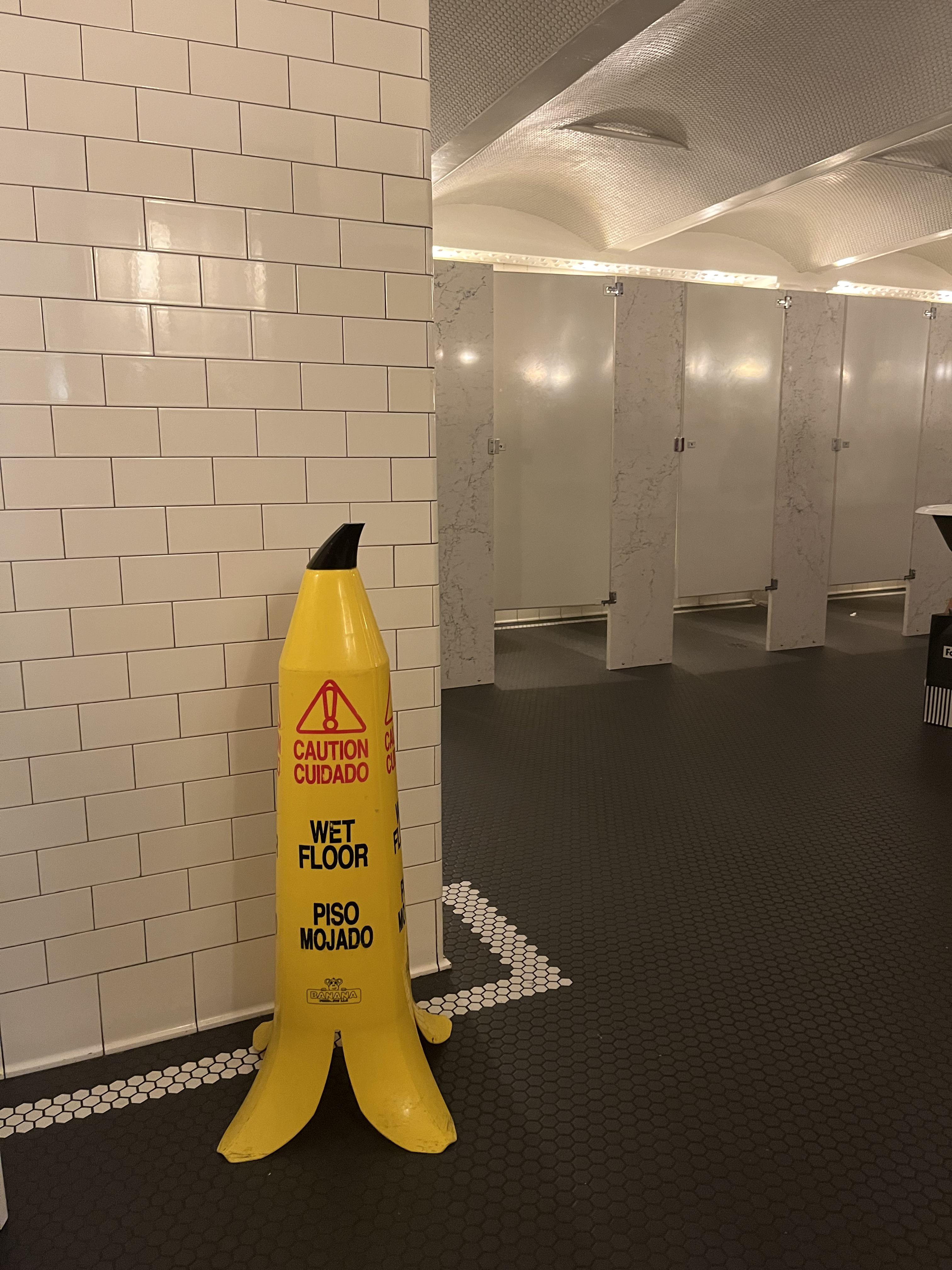 Caution Wet Floor sign shaped like a banana | Scrolller