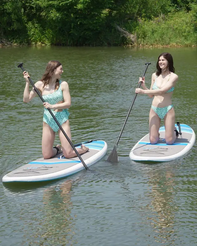 Paddle boarding with her sister | Scrolller