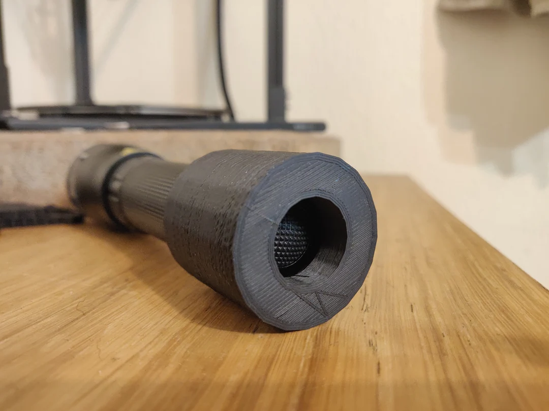 A button cover for my torch to stop it turning on in my bag | Scrolller