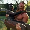 Grace Jones and Arnold on the set of Conan the Destroyer in 1973 | Scrolller
