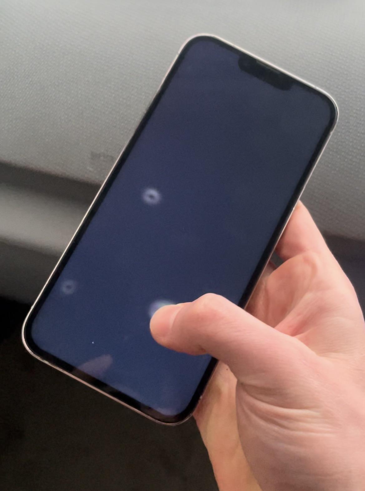 Does anyone know how to fix this black screen (iPhone 13 Pro Max)? Every time I click the screen ...