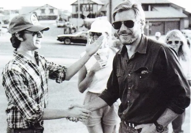 Steven Spielberg and Harrison Ford on the sets of "E. T. The Extra Terrestrial" in 1981 | Scrolller