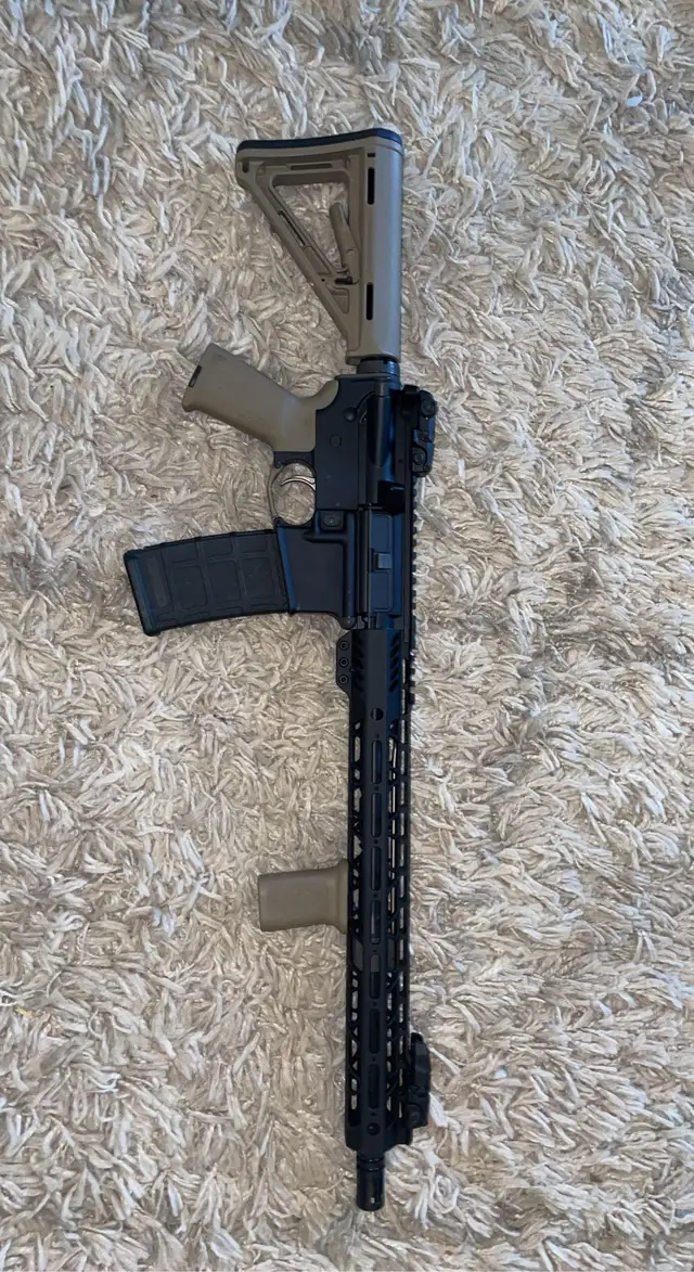 First AR15 build finished. Drove all the pins with a pair of channel locks and tightened the ...