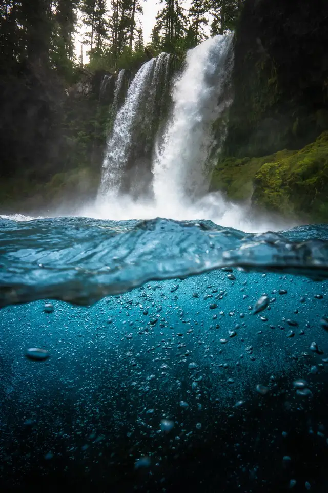 A partially underwater photo of a waterfall in Central Oregon. [1000x1500][OC] | Scrolller