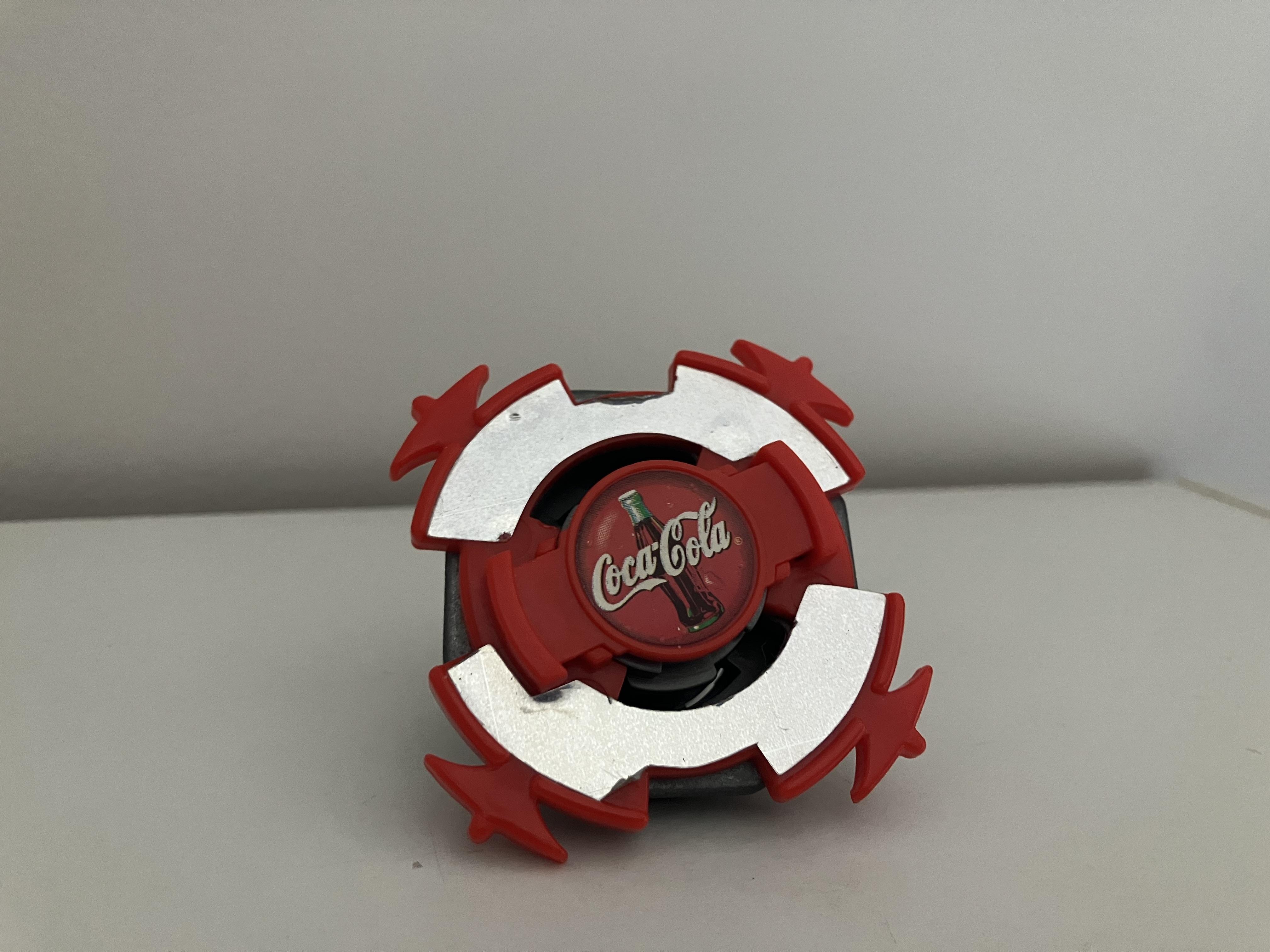 Any collectors know about this Coca Cola beyblade? | Scrolller