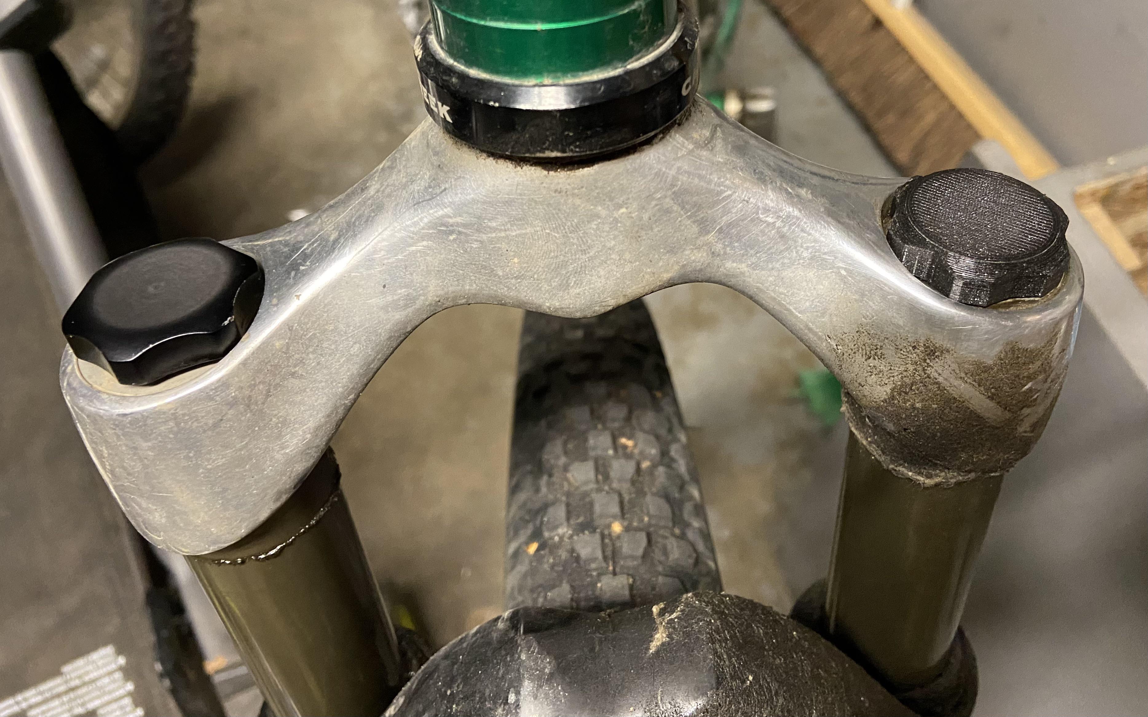 Replacement Bomber valve stem cap. (Yes, the fork needs new seals) | Scrolller