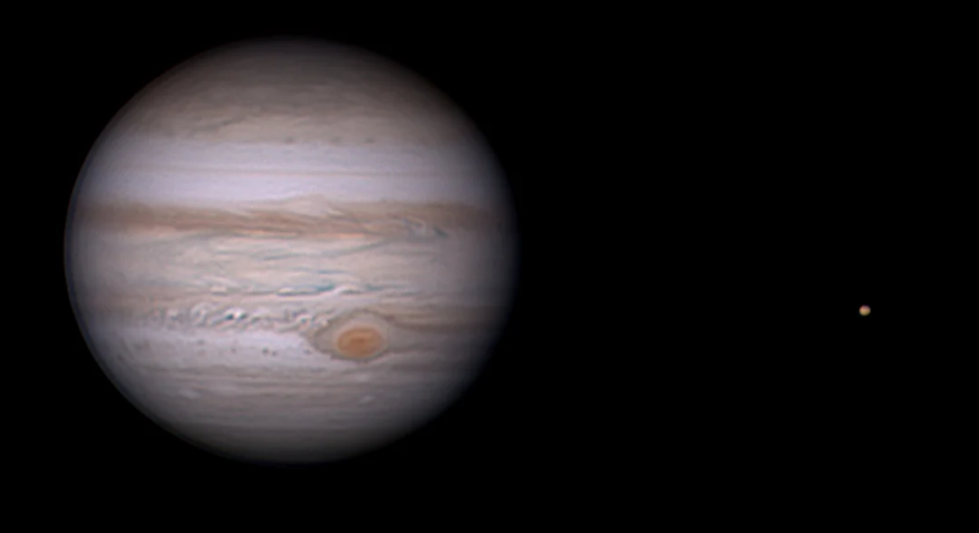 Jupiter and it's moon Io | Scrolller