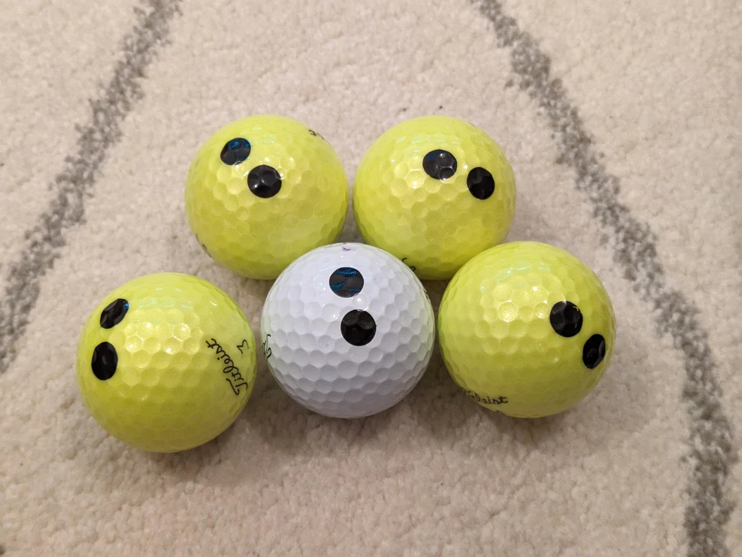 Titleist balls with two black circles? | Scrolller