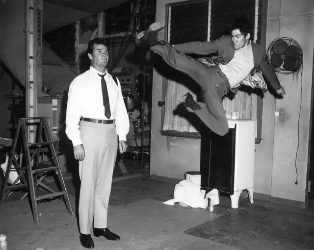 Bruce Lee and James Garner hanging out on the set of "Marlowe", 1968 | Scrolller