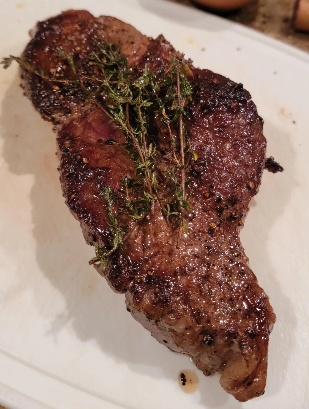 Homemade Cast Iron Seared New York with Butter and Thyme | Scrolller