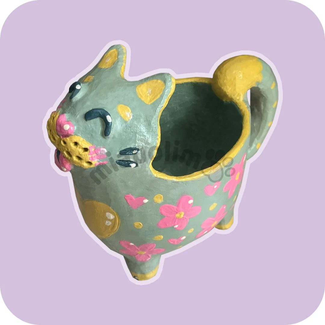 watering cat, miauolim, kilned clay painted w acrylic, 2023 | Scrolller