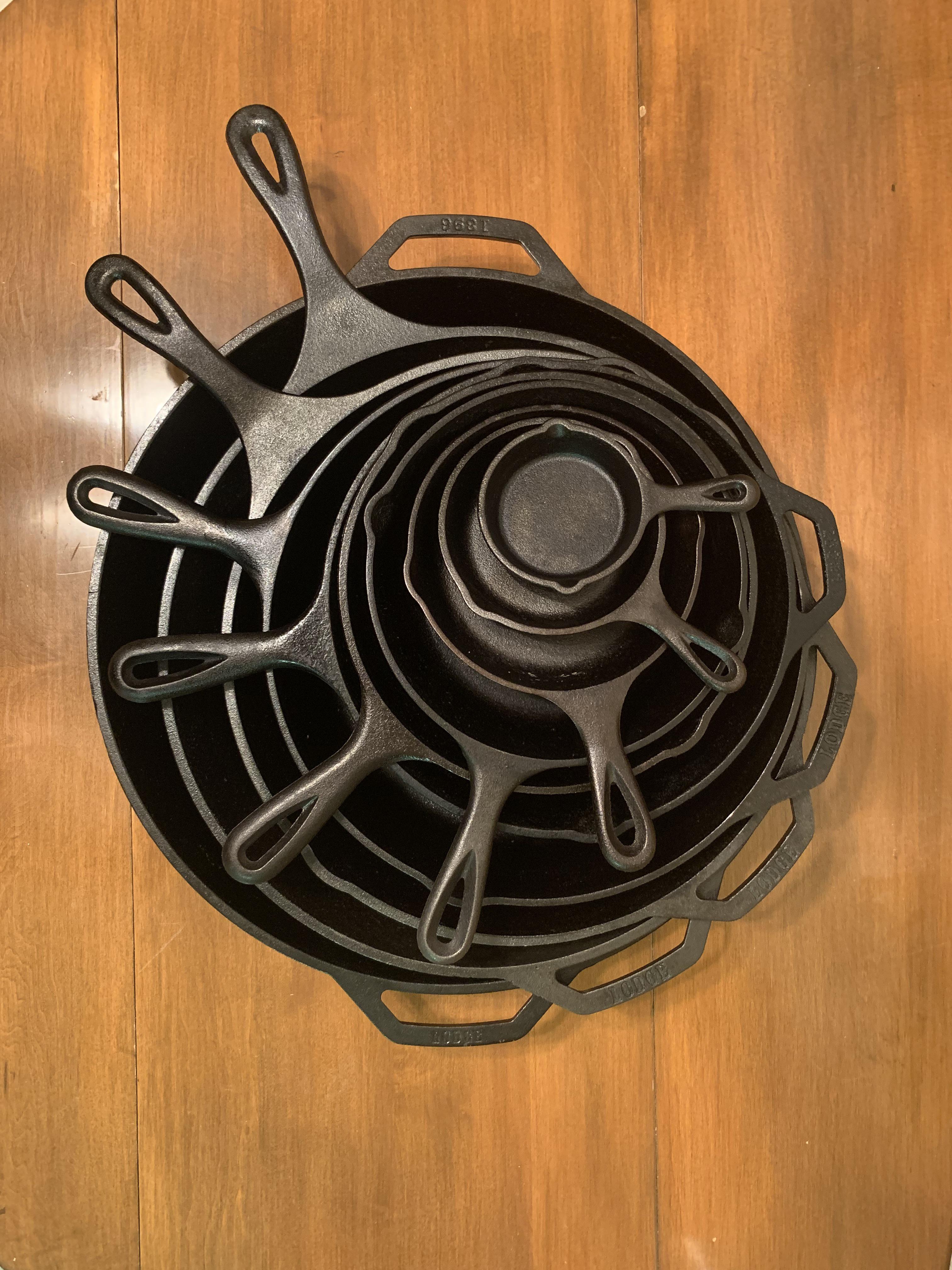 Lodge full set of classic skillets and flat bottom ovens | Scrolller