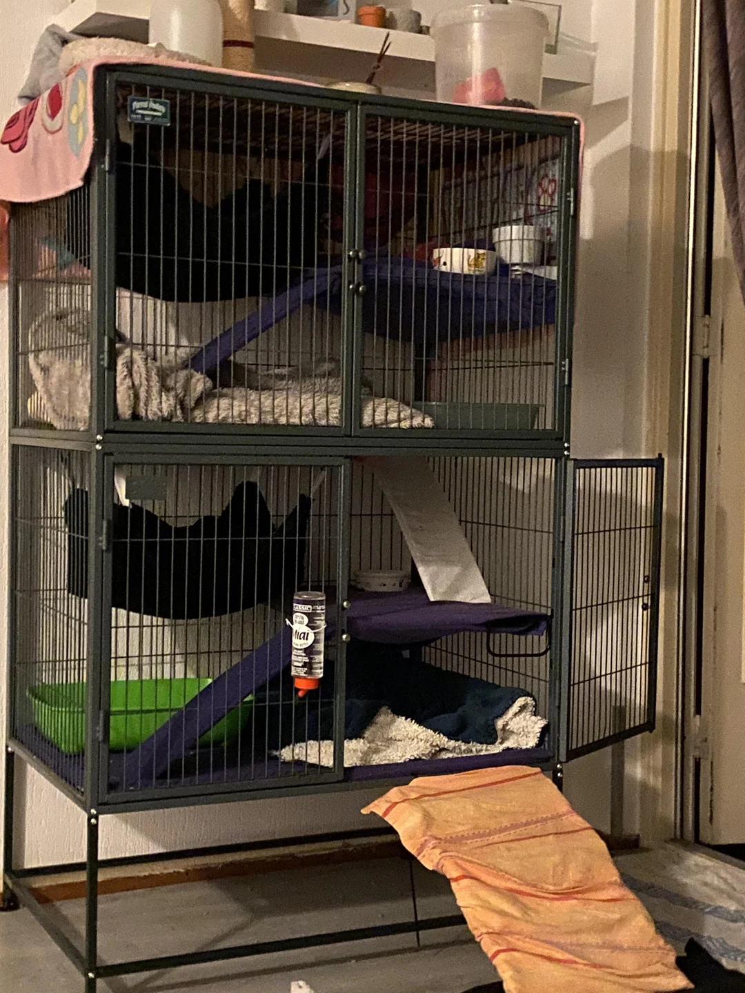 This is our cage setup, someone asked how to ferret proof the cage on the outside. | Scrolller