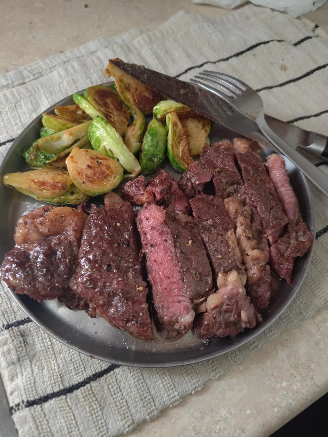Grilled ribeye pan fried brussel. Happy Memorial day. | Scrolller