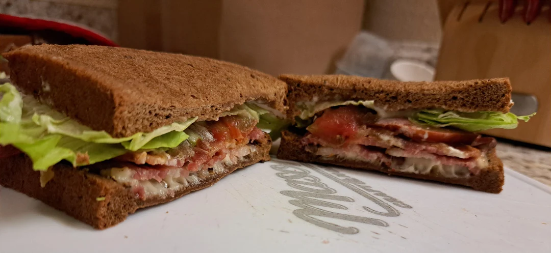 BLT on rye with home grown tomatoes and pepper jack cheese. | Scrolller