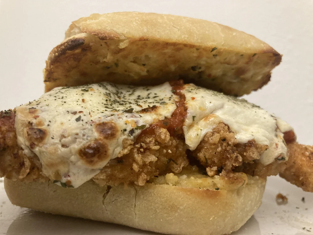 Chicken parm on ciabatta garlic bread | Scrolller