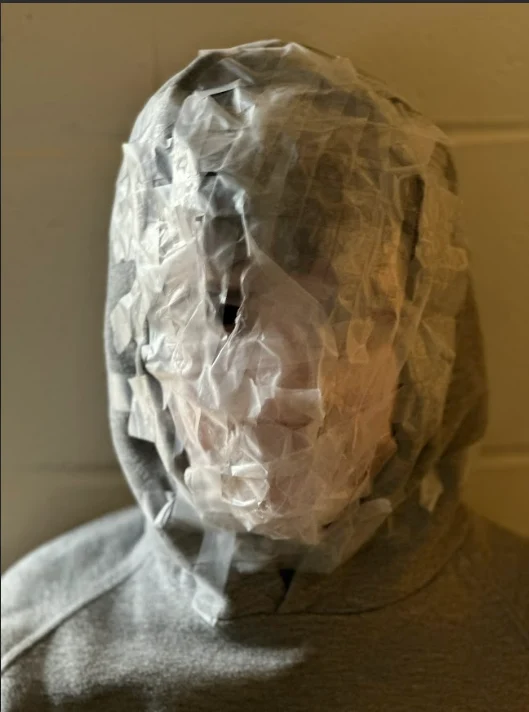 Artwork - Charlie, wth-is-tenese-balb, tape on face, 2023 | Scrolller